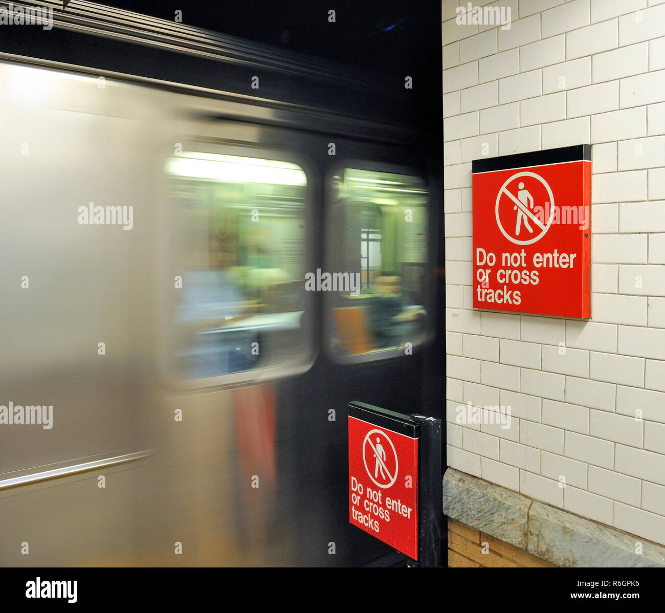 Dont not enter or cross tracks sign in the New York subway Stock Photo ...