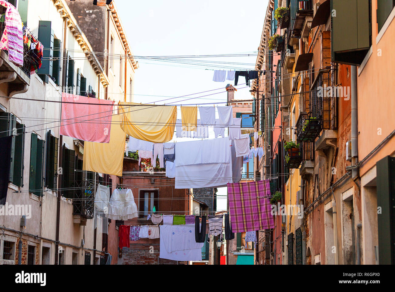 Typical view the streets of Venice washed clothes drying on cords ...