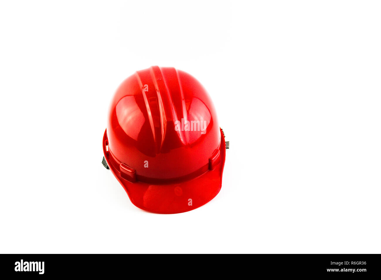 Red plastic helmets of engineer Stock Photo - Alamy