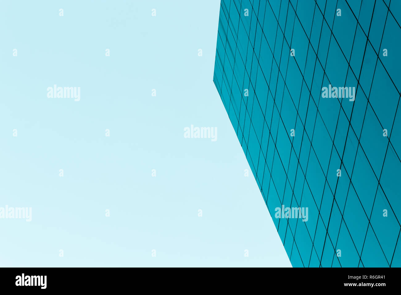 Top of blue mirror decorated building Stock Photo - Alamy