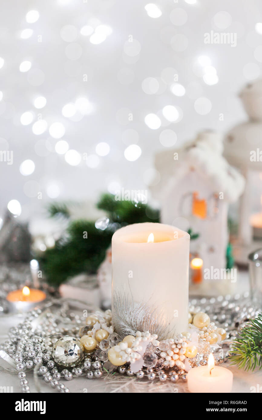 White candle on holiday silver background, Christmas concept Stock ...