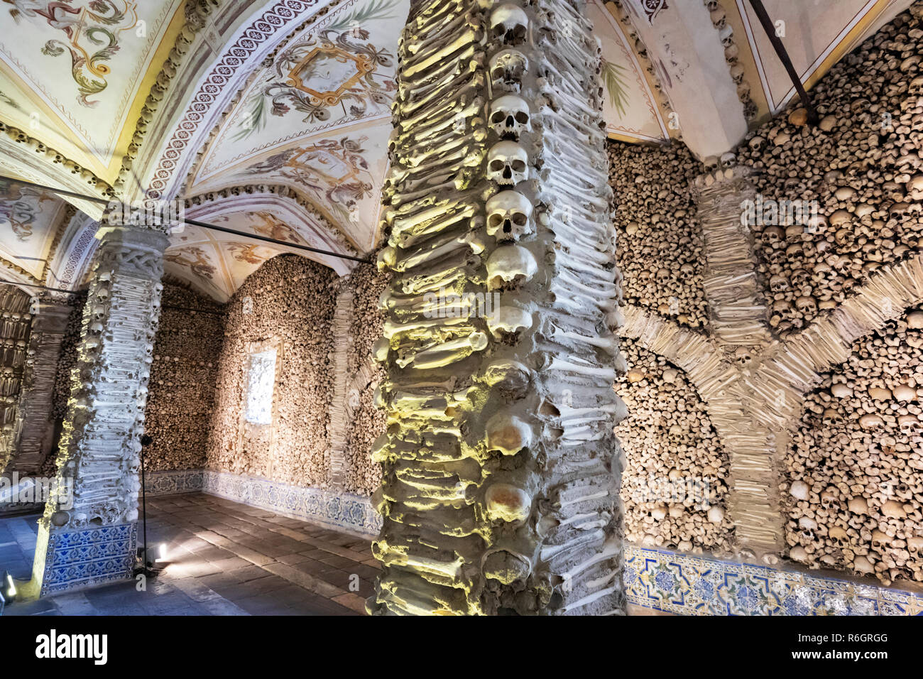 Skulls and bones of former monks decorating the walls inside the Capela ...