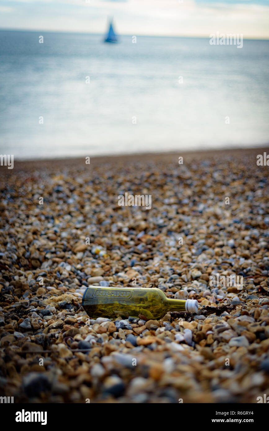 Beach pollution, plastic and waste from the ocean on a beach Stock ...