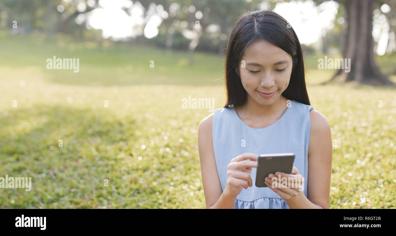 Chinese woman use of mobile phone Stock Photo - Alamy