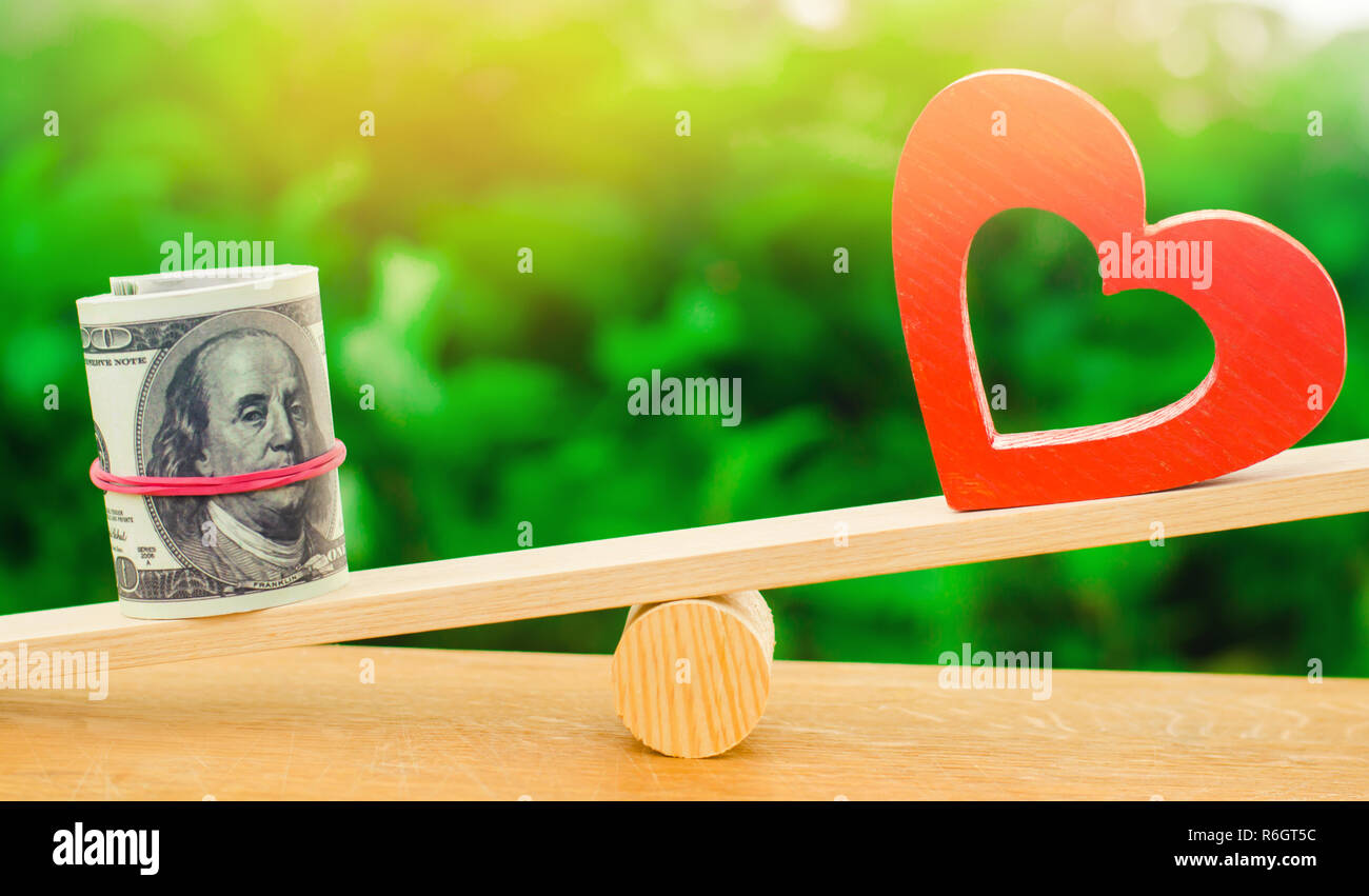 Money versus love concept. Passion versus profit. Family or career ...