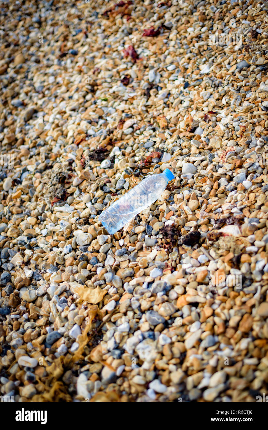 Beach pollution, plastic and waste from the ocean on a beach Stock ...