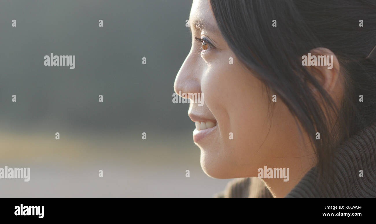 Side profile of woman look at the sunset Stock Photo - Alamy