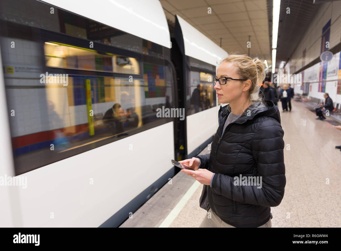 Waiting at metro hi-res stock photography and images - Alamy