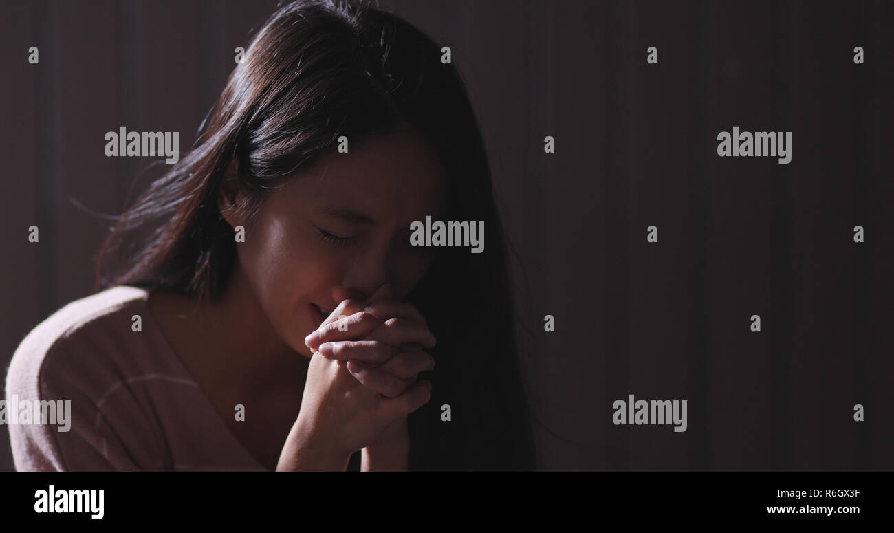 Christian women praying Stock Photo - Alamy
