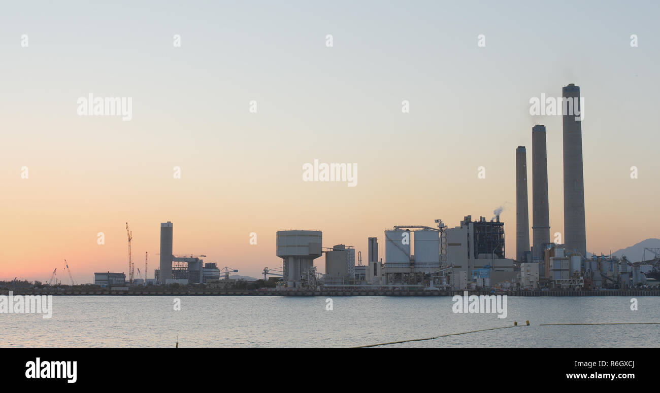 Power station under sunset Stock Photo - Alamy