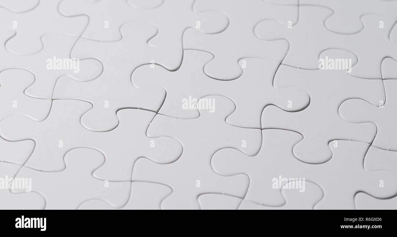 Complete White puzzle Stock Photo - Alamy