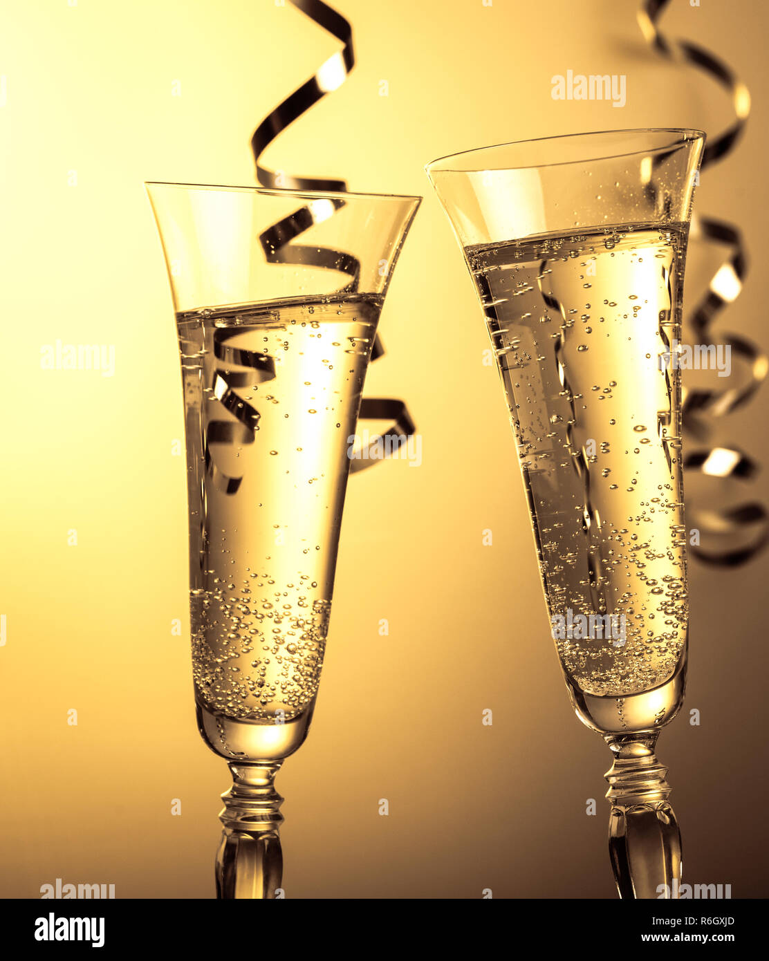 Two glasses of champagne. Symbol of New Year or Christmas celebration ...
