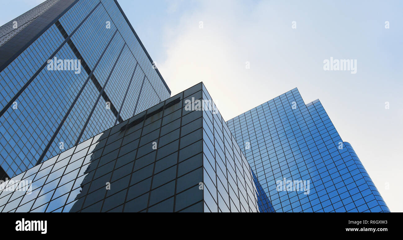 Business office tower with sunny skyline Stock Photo - Alamy