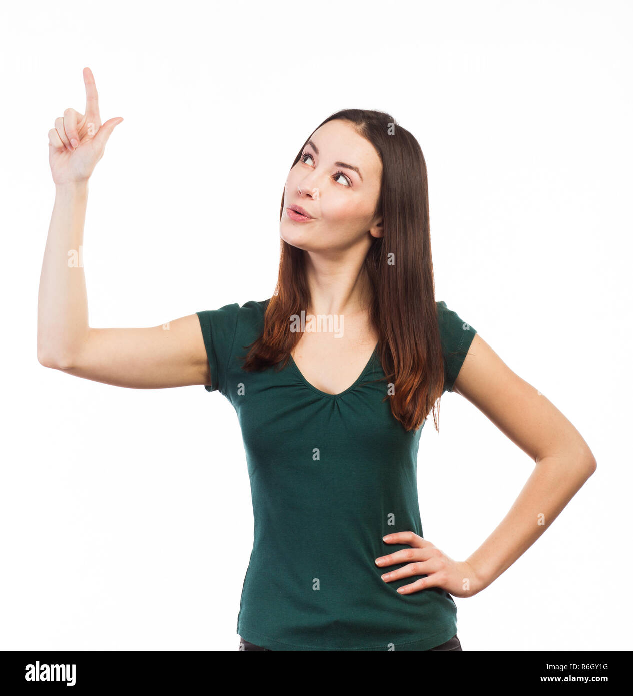 Pretty girl pointing up Stock Photo - Alamy