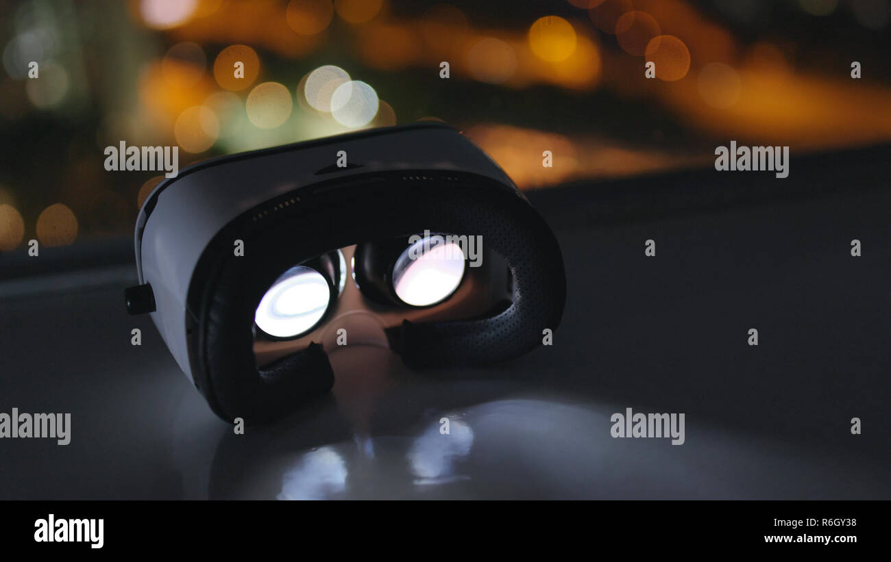 VR device playing video at night Stock Photo - Alamy