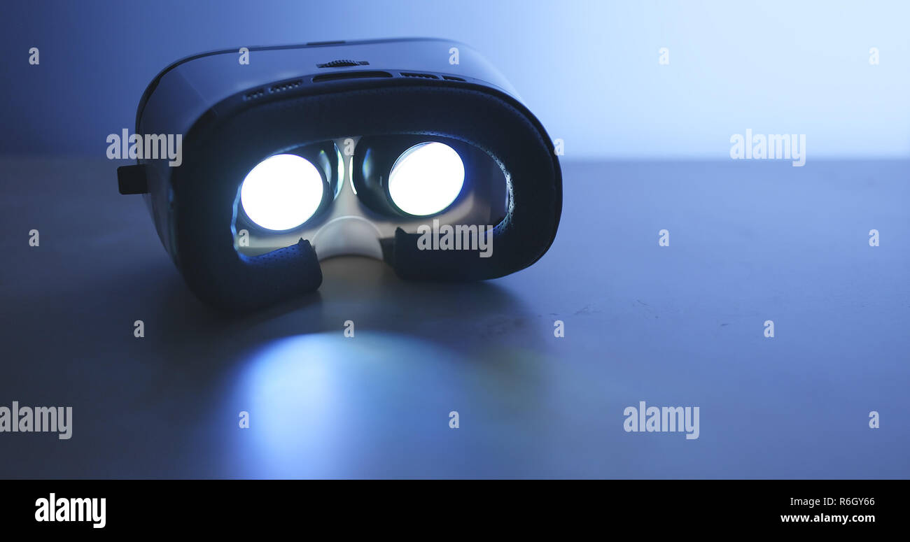 VR device playing inside at night Stock Photo - Alamy