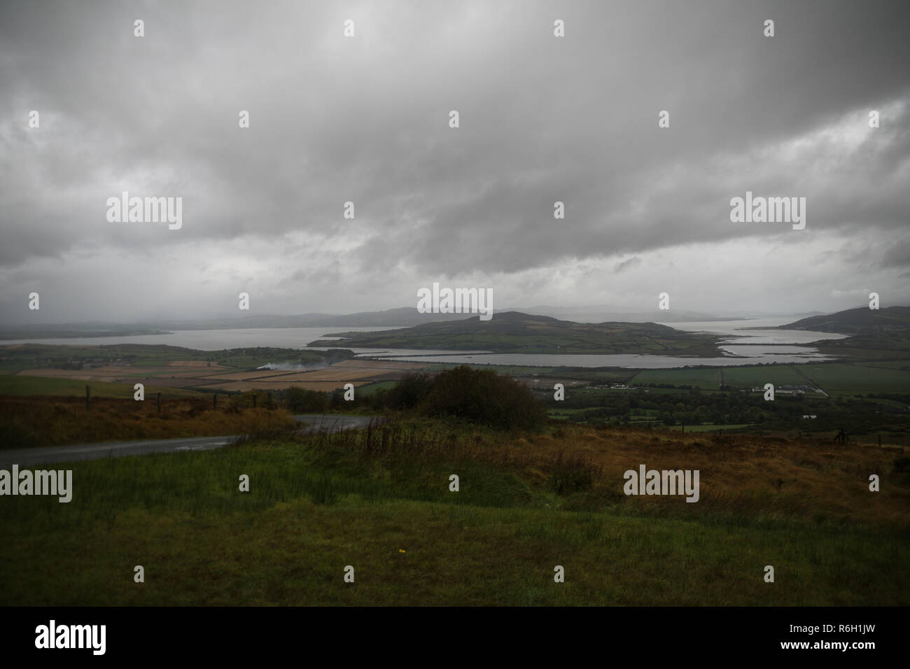 landscape with a cloudy sky at the countryside donegal Stock Photo - Alamy
