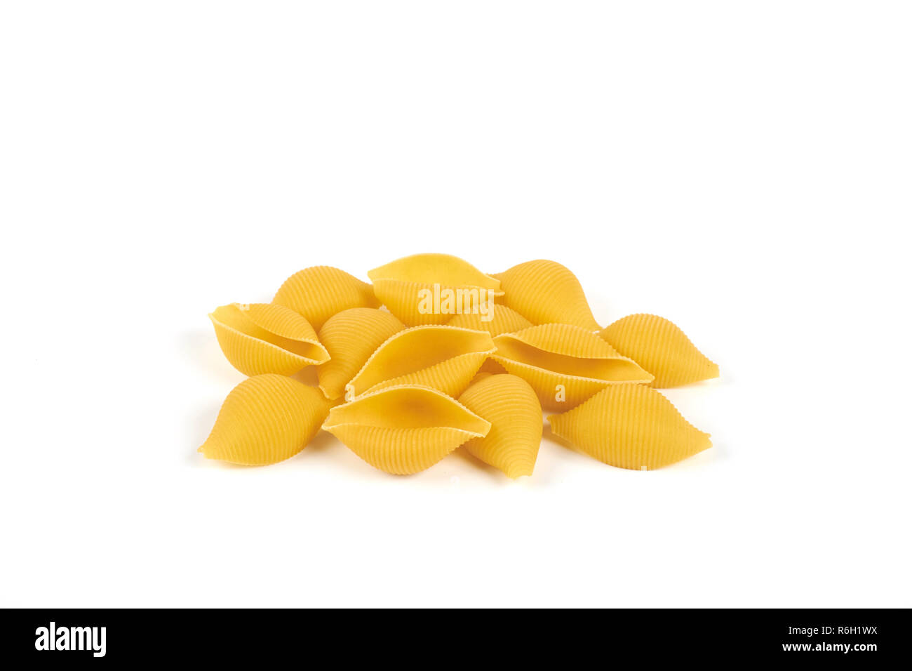 conchiglioni pasta shells , isolated on a white background Stock Photo ...