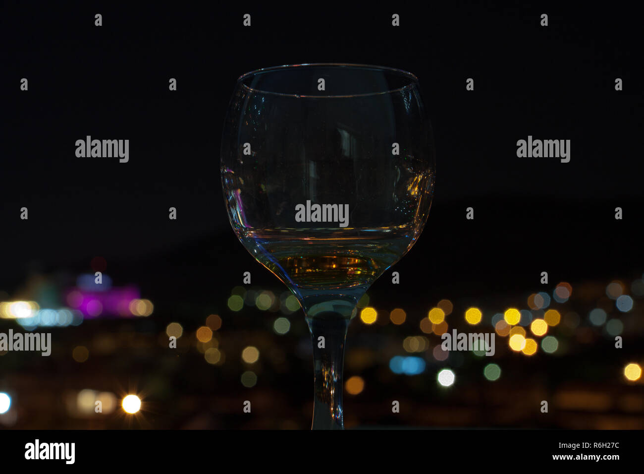glass in front of defocused lights Stock Photo - Alamy