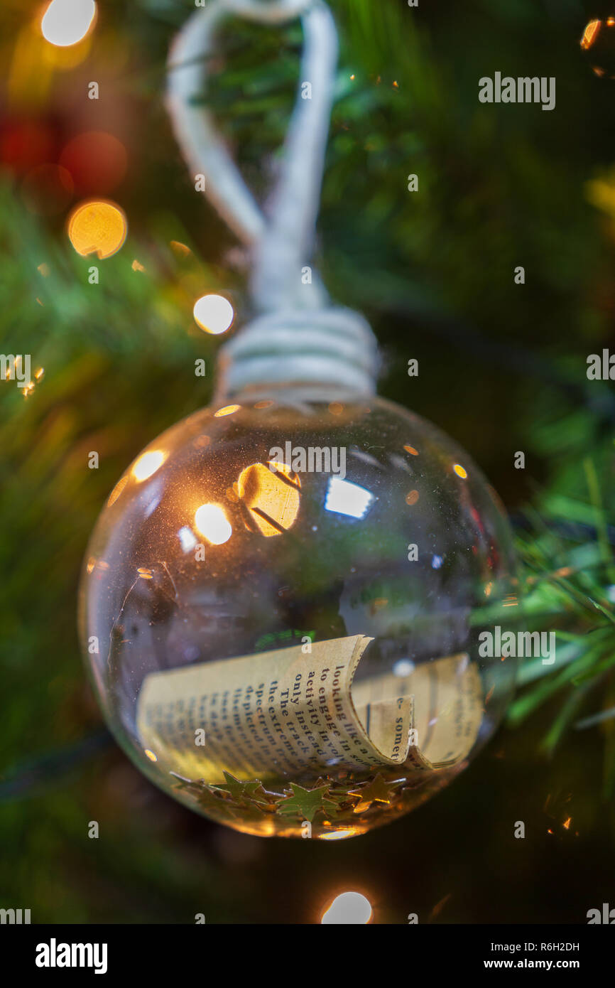 Close-up on a Christmas Tree of a hanging decorative message ball in ...