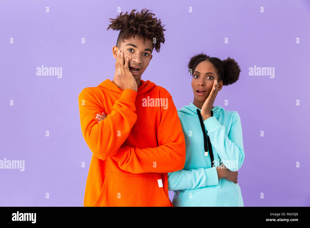 Photo of shocked african american brother and sister screaming and ...