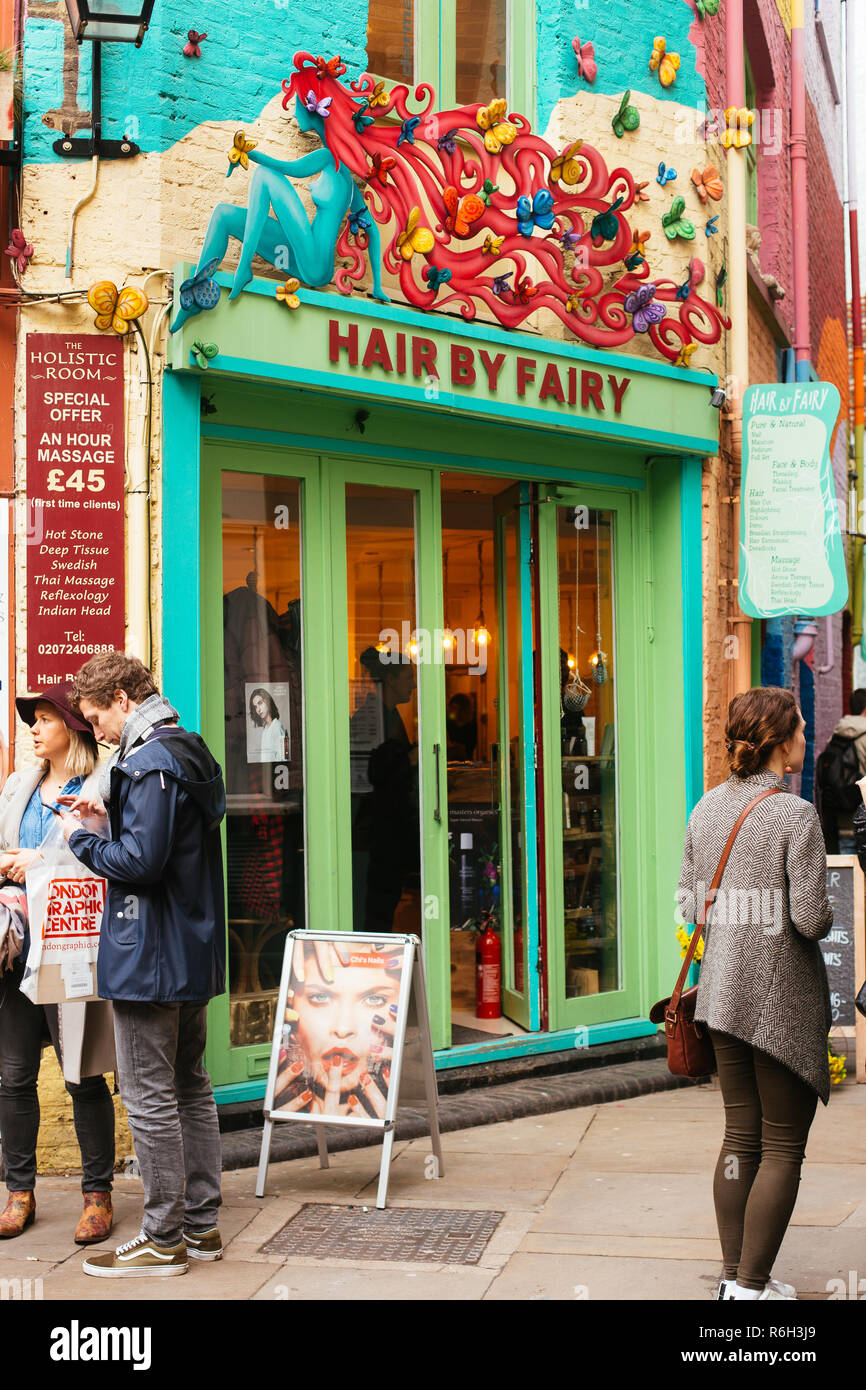 LONDON, ENGLAND-11 MARCH 2018: tourists walking in Neal's Yard, iconic ...