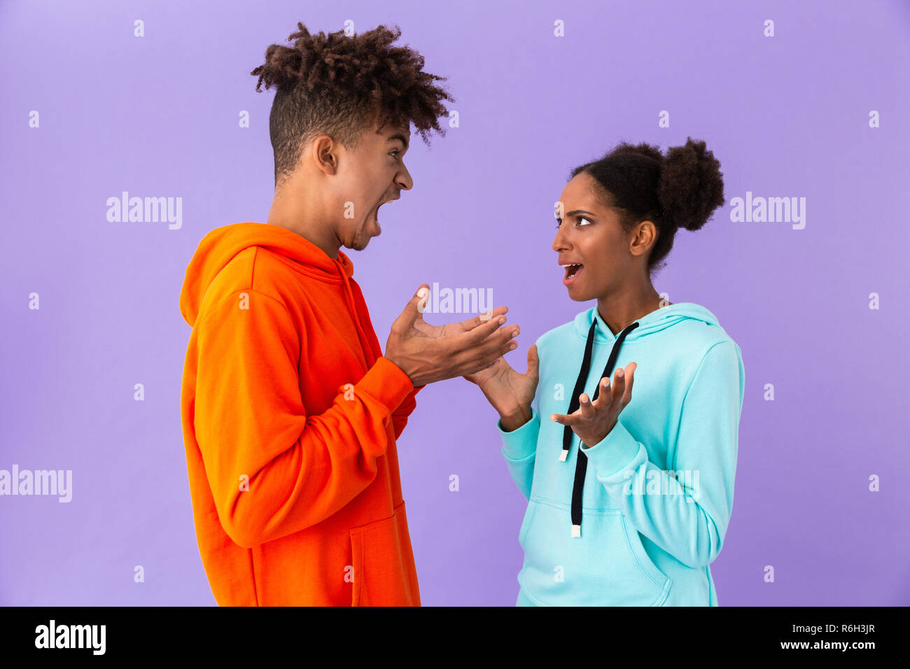 Photo of unhappy african american brother and sister standing together ...