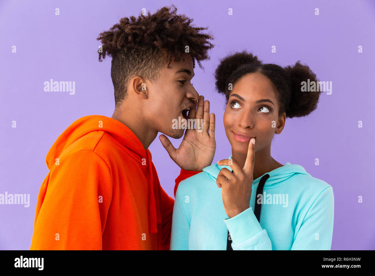 Talking by ear hi-res stock photography and images - Alamy