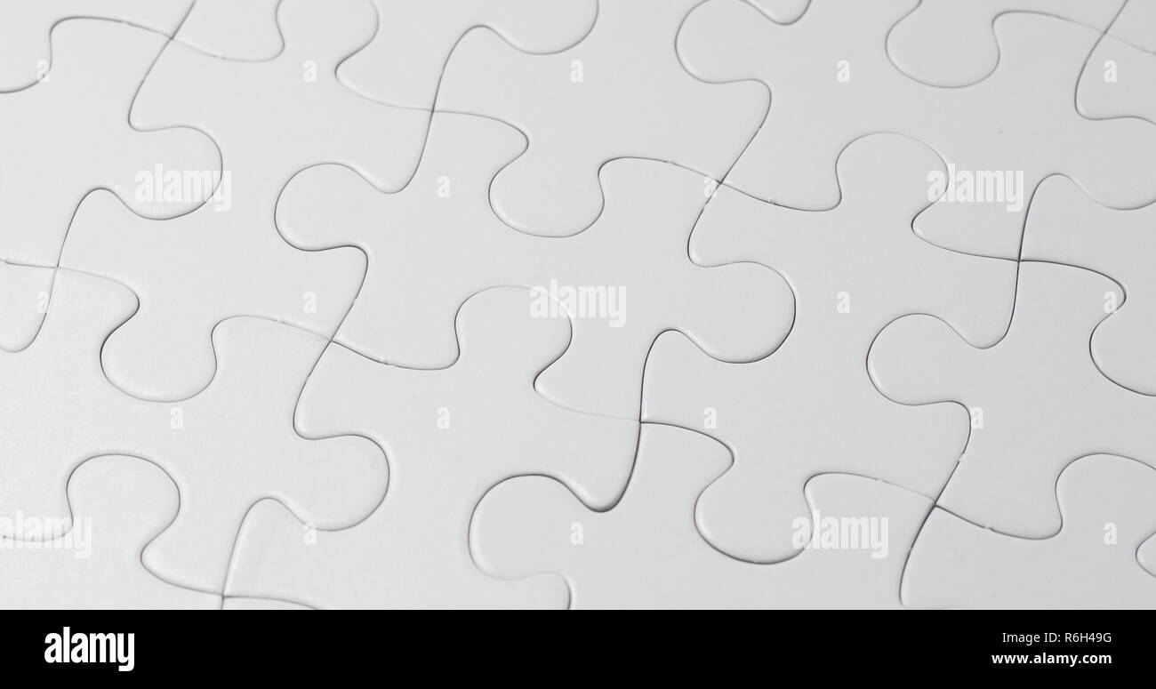 Whole white complete puzzle Stock Photo - Alamy
