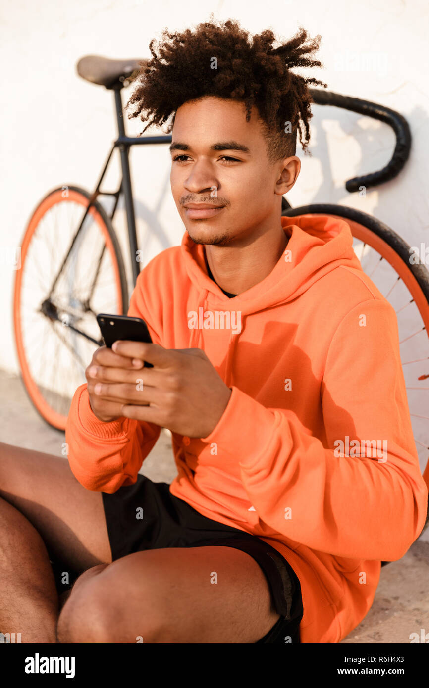 Male athlete using app on hi-res stock photography and images - Alamy