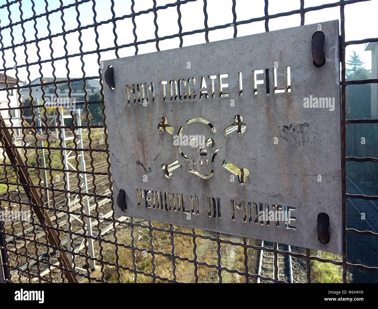 Notice placed on the overpass, pedestrian, adjacent to the railways ...