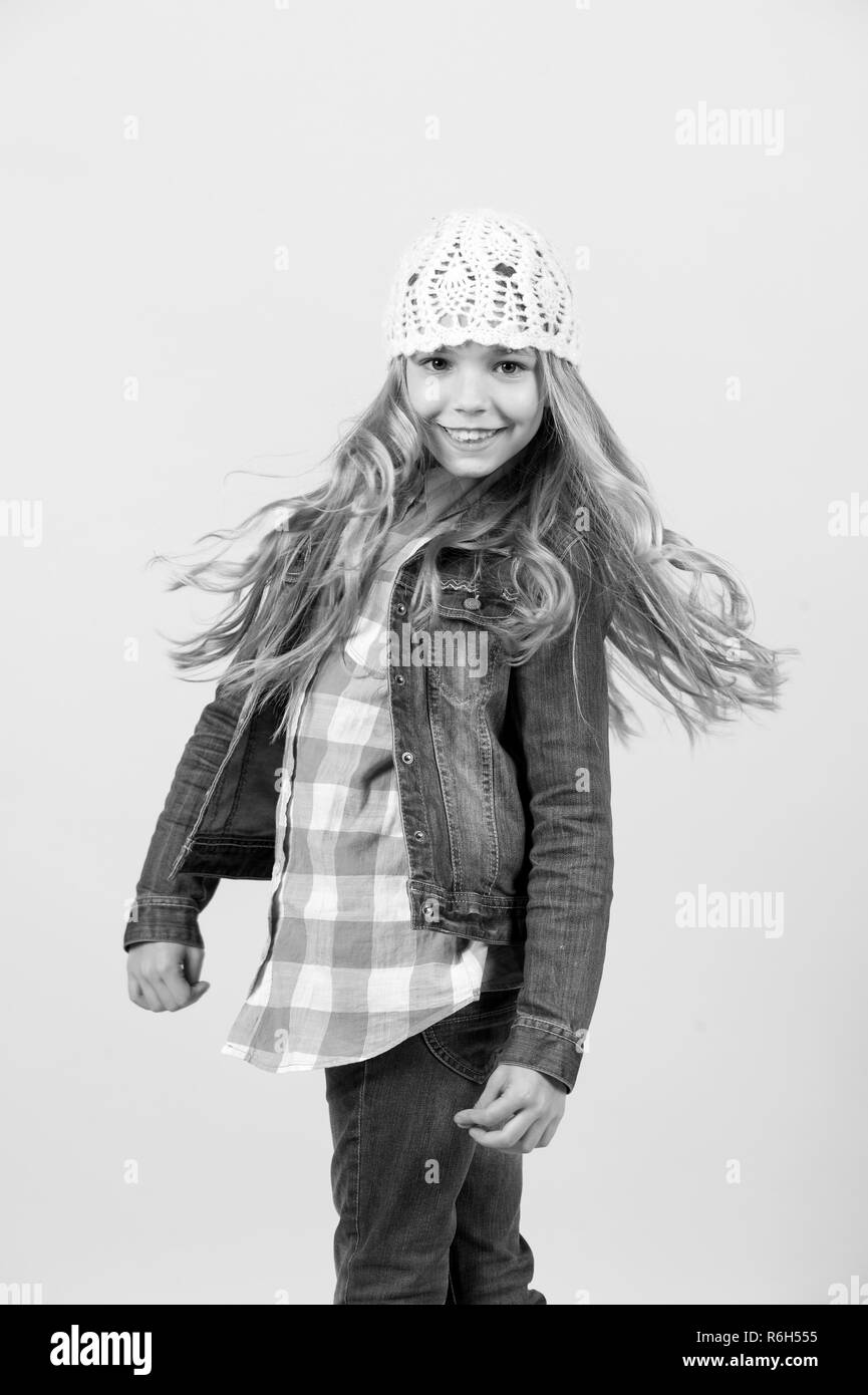 Happy childhood concept. Child model smile with long blond hair ...