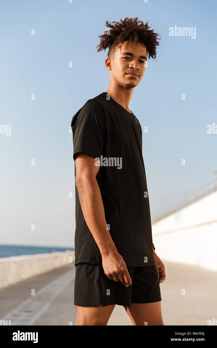 African male posing at the beach hi-res stock photography and images ...