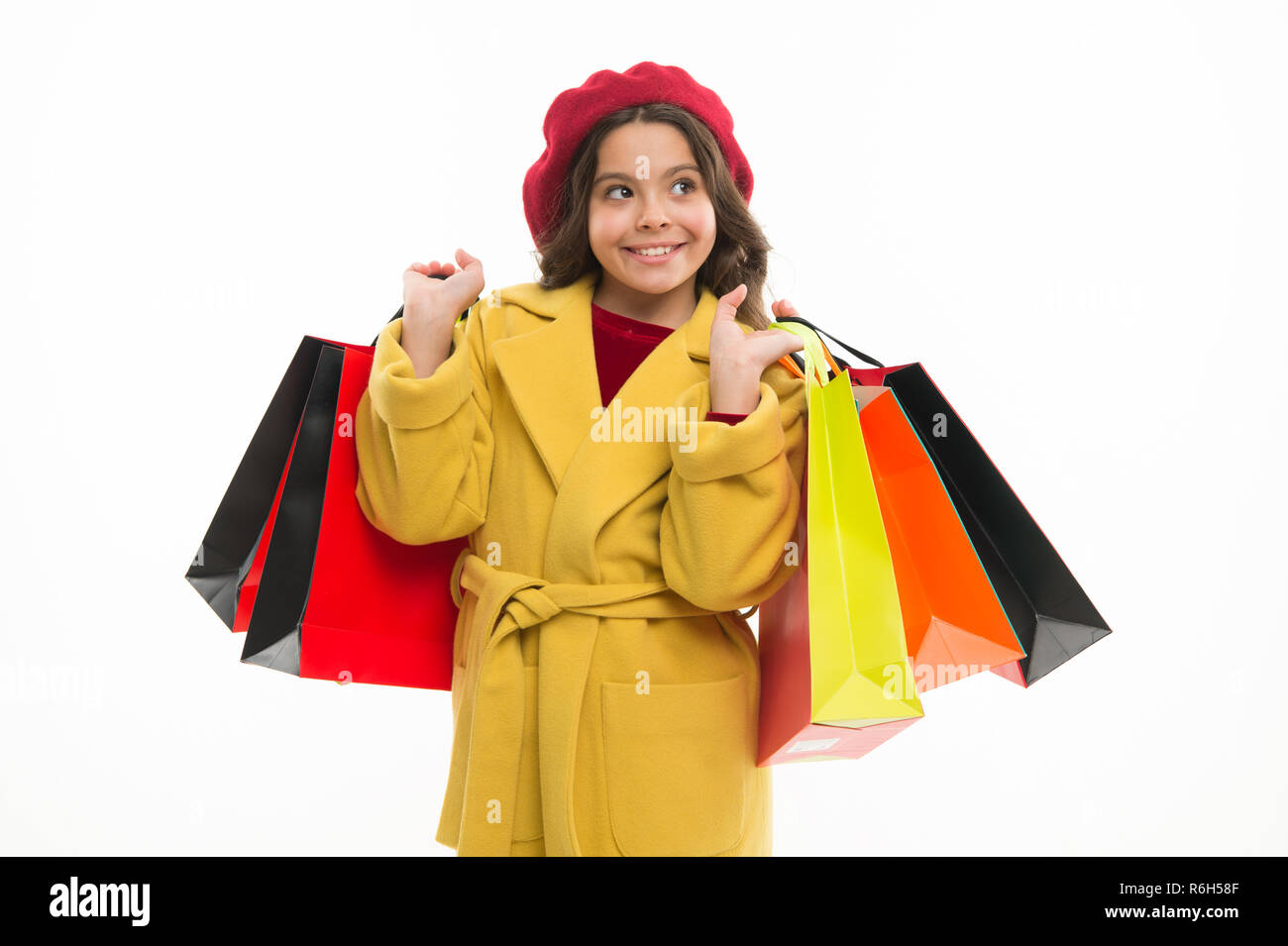 Nice purchase. Little shopper. Small girl with shopping bags. Small ...