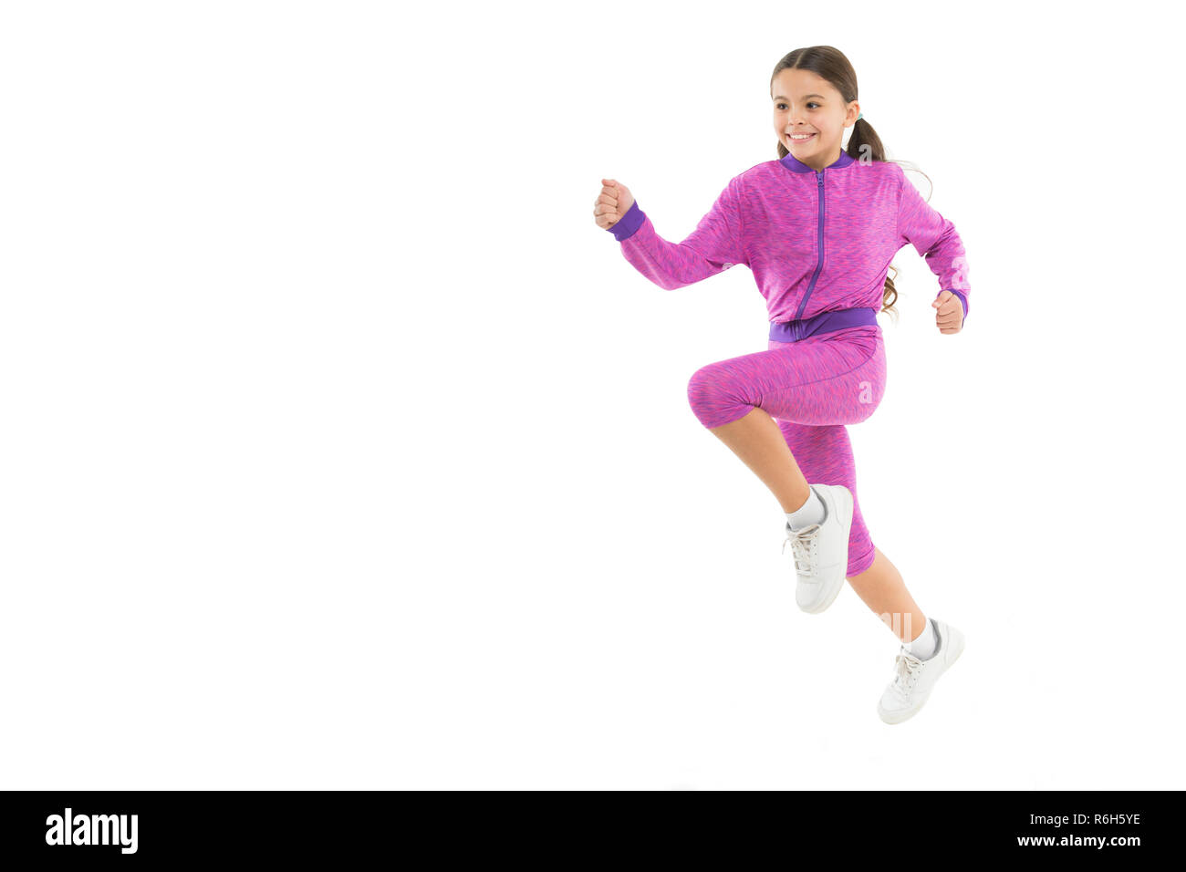 Girl cute kid with long ponytails sportive costume jump isolated on ...