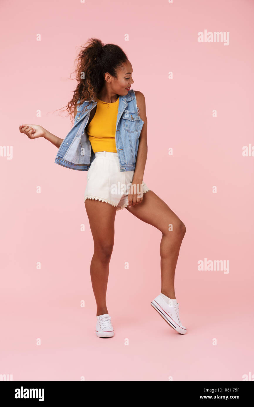 Image of amazing young beautiful woman dancing isolated over pink ...