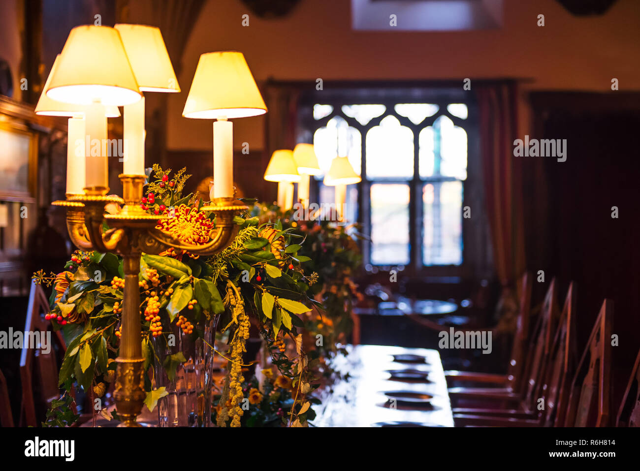 Close up medieval british castle interior dining table with plates ...