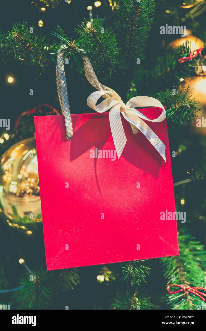 Red gift box hanging hi-res stock photography and images - Alamy