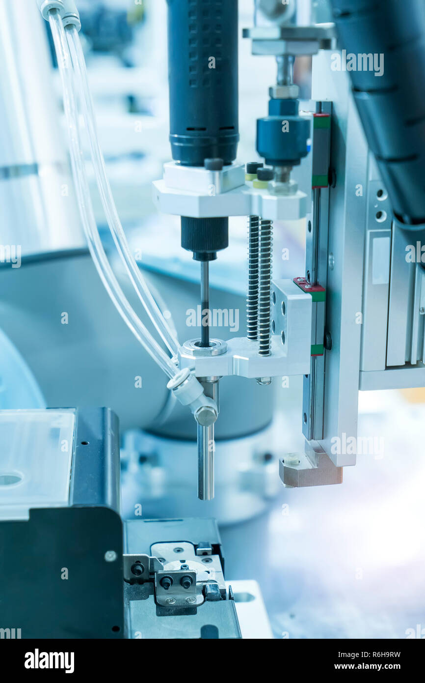 robot drill machine tool at pcb board industrial manufacture factory ...