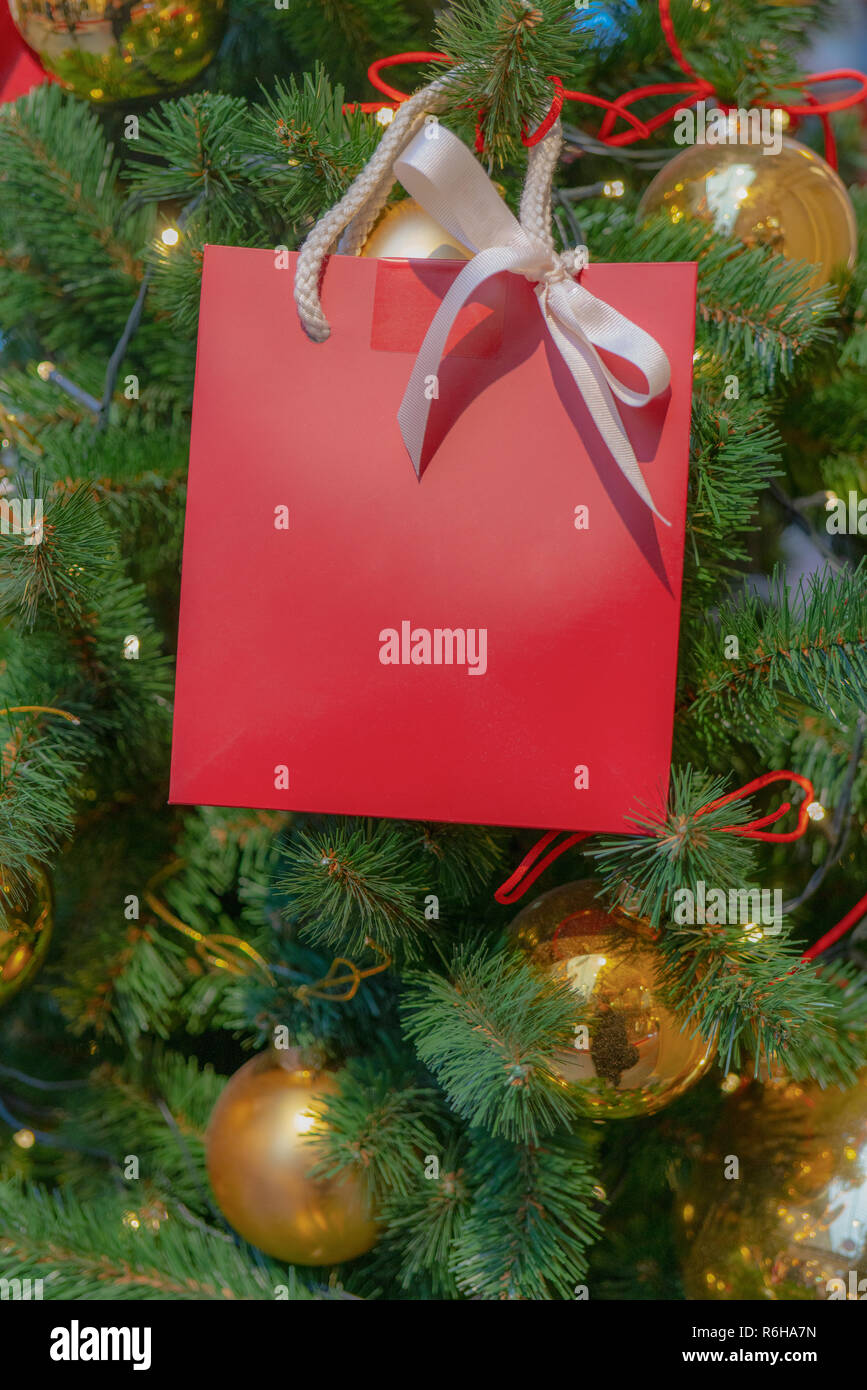 Red gift box hanging hi-res stock photography and images - Alamy