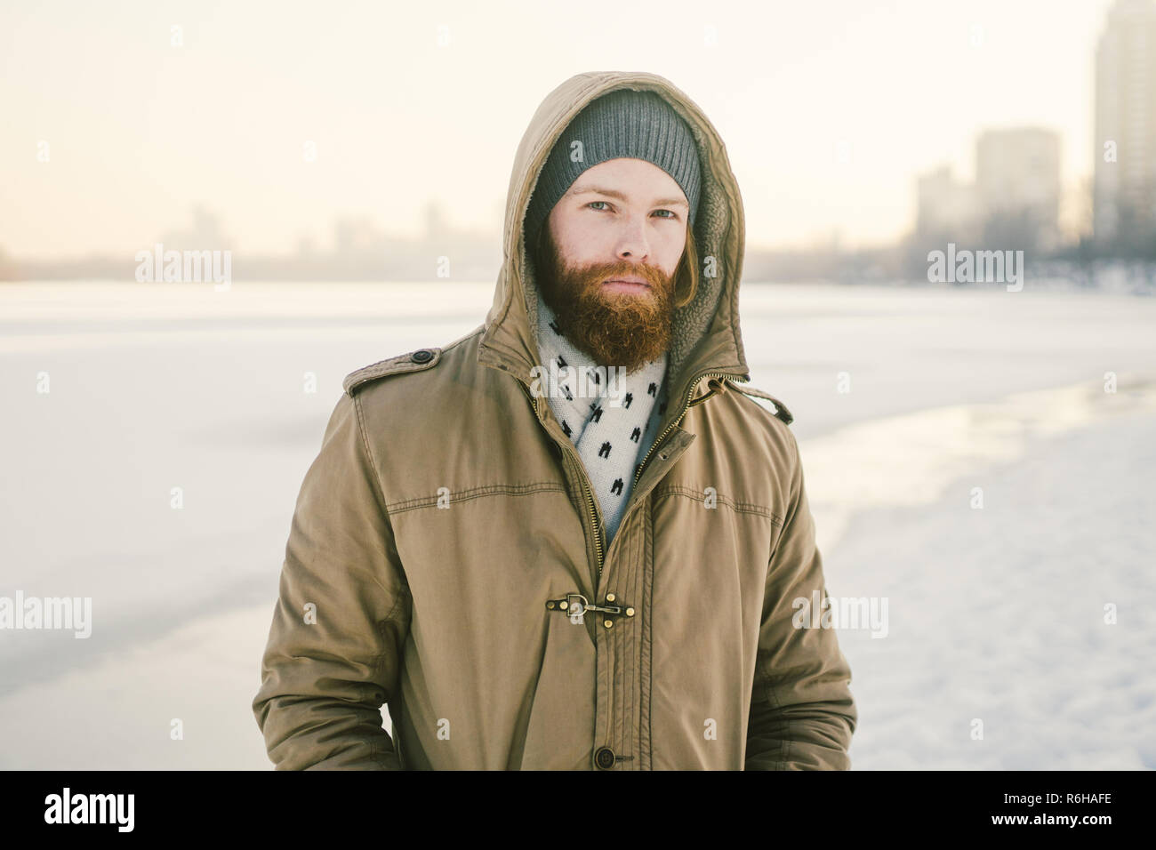 Male model posing in snow hi-res stock photography and images - Alamy