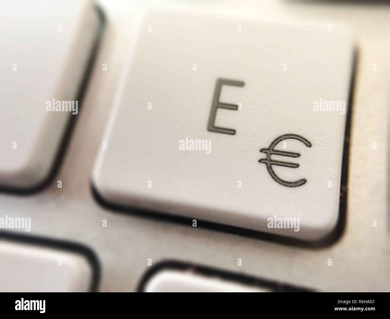 e letter and euro coin symbol on a pc keyboard button Stock Photo - Alamy
