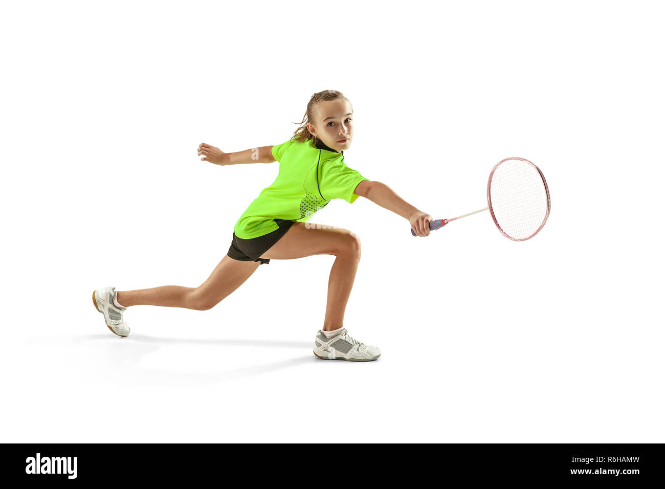 The one caucasian young teenager girl playing badminton at studio. The ...
