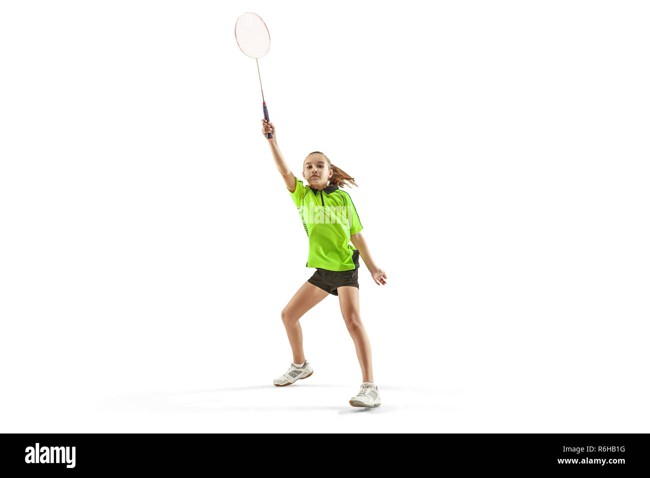 The one caucasian young teenager girl playing badminton at studio. The ...