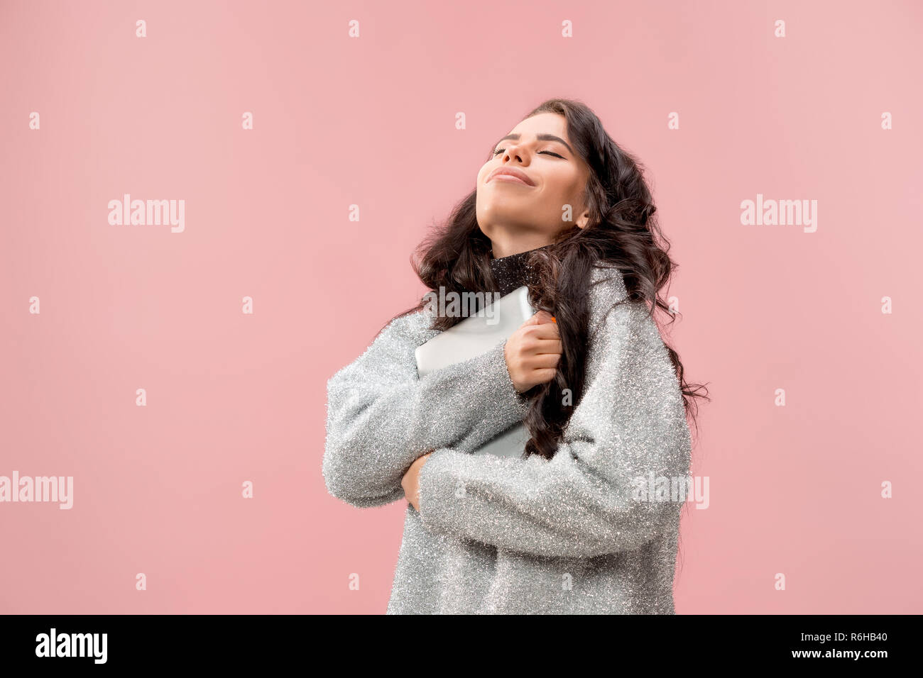 The female student hugging laptop. Love to computer concept. Attractive ...