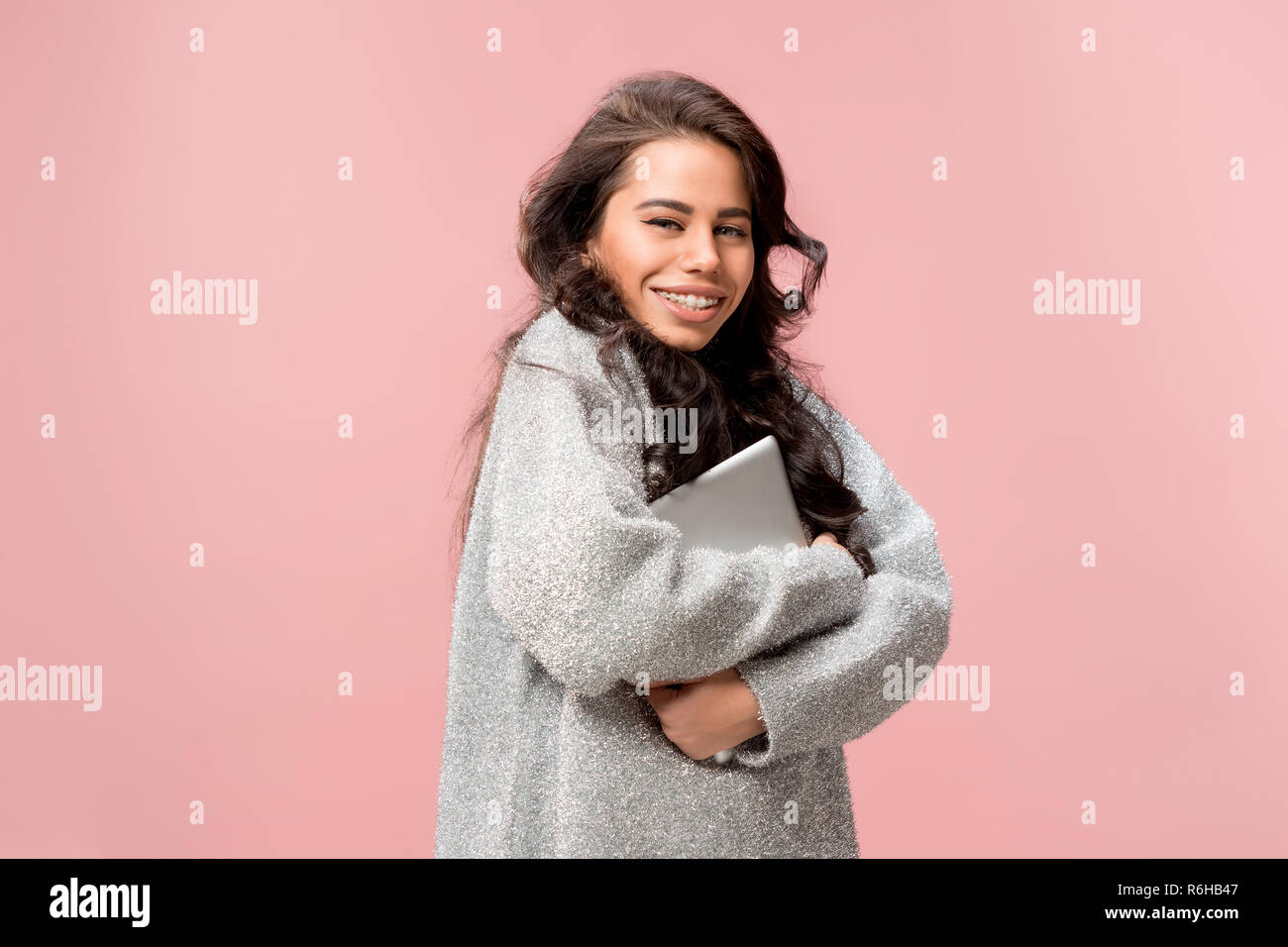 The female student hugging laptop. Love to computer concept. Attractive ...