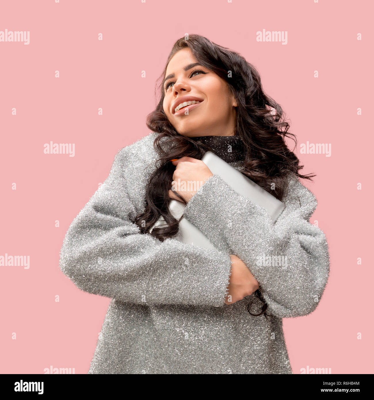 The female student hugging laptop. Love to computer concept. Attractive ...