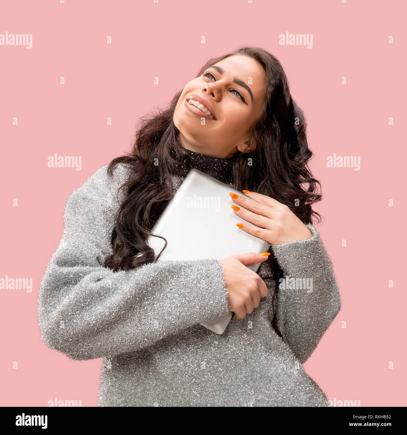 The female student hugging laptop. Love to computer concept. Attractive ...