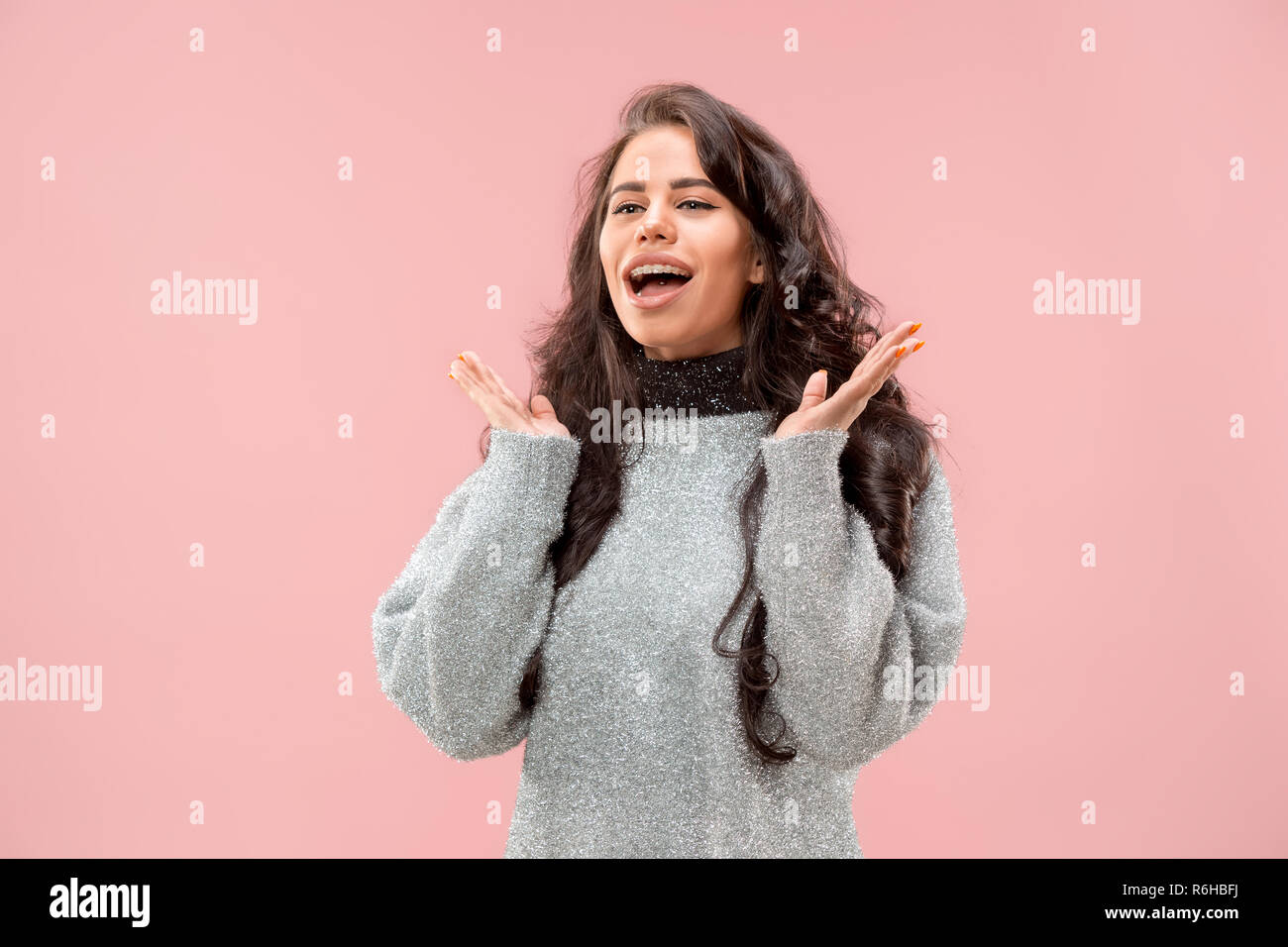 Delight. Beautiful female half-length front portrait isolated on pink ...