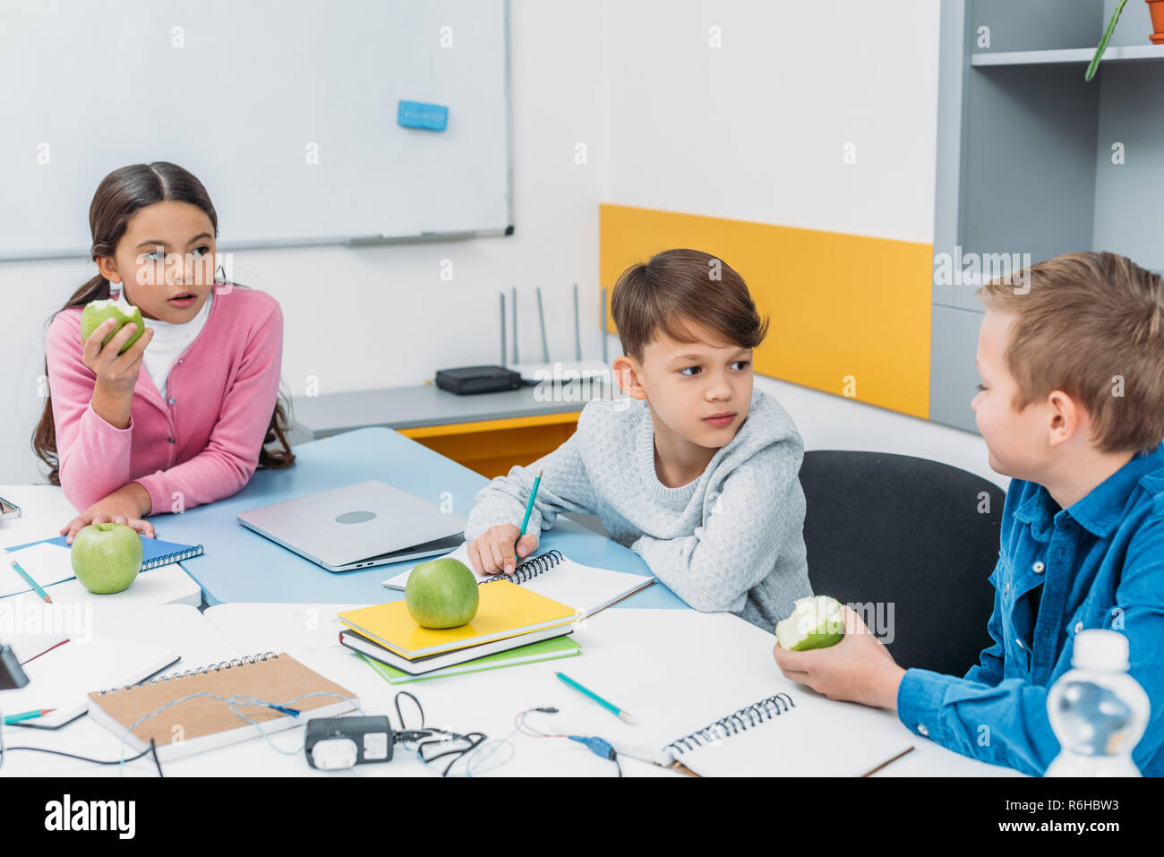 Girl having lunch at her desk hi-res stock photography and images - Alamy